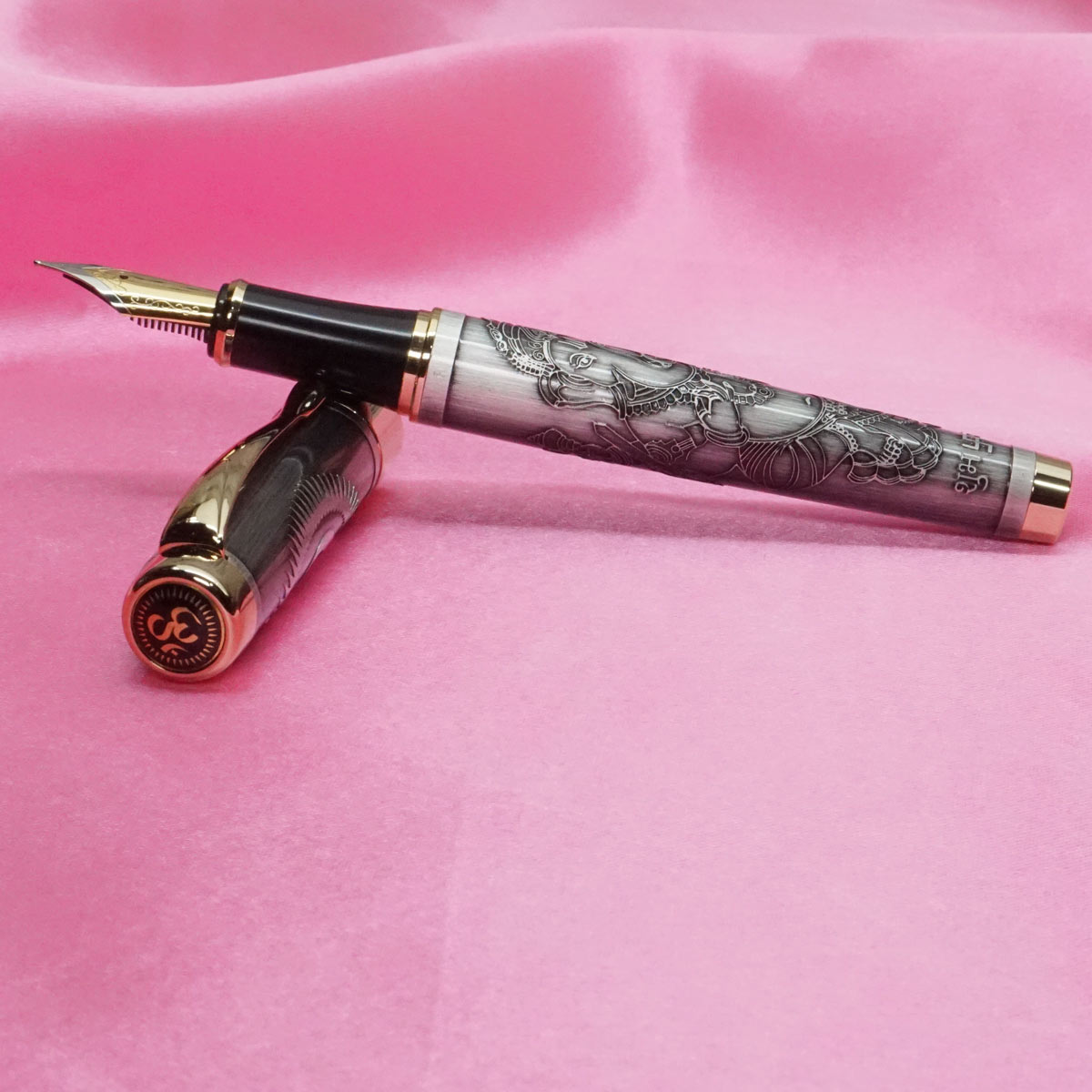 Penhouse.in Ganesh And Om Art Work Designed Gun Metal Body With Medium ...