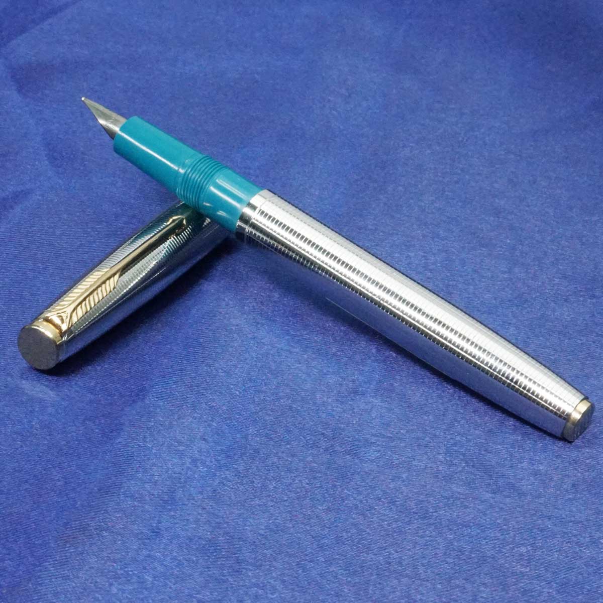 Gama No 19 Silver Color Body With Turquoise Blue Color Holding Parker ...